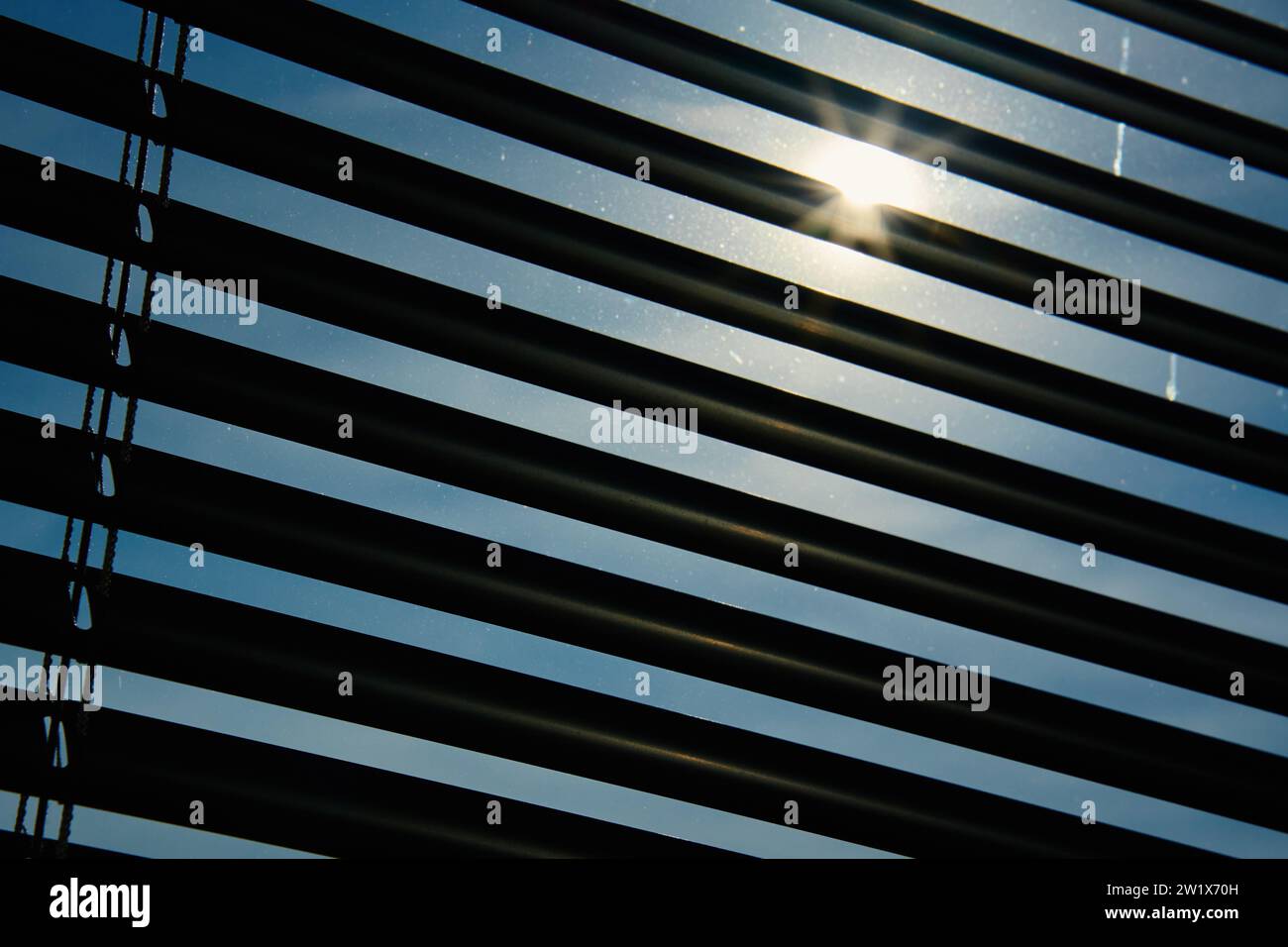 Blinds on the window to protect from sunlight. Close up shot of modern ...