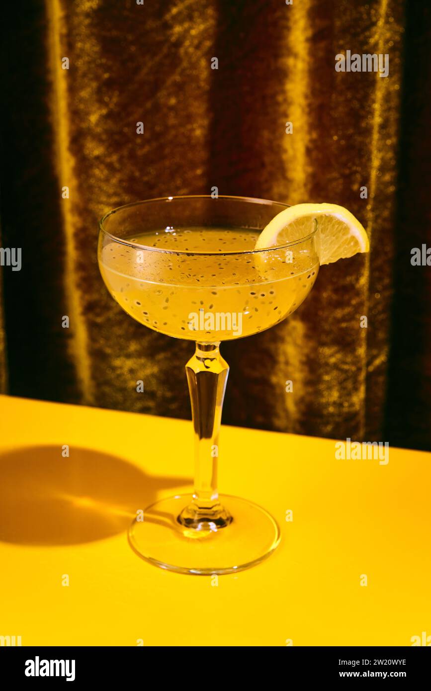 Close up photo of exotic alcohol drink in tall glass with wide mouth ...