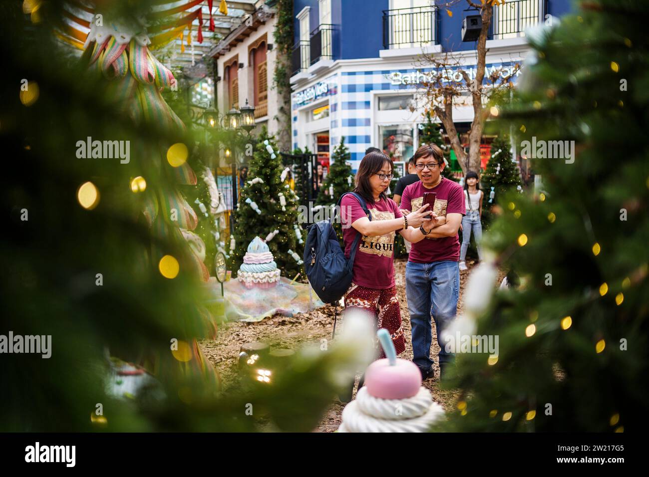 Bandung, West Java, Indonesia. 21st Dec, 2023. Visitors take selfies ...