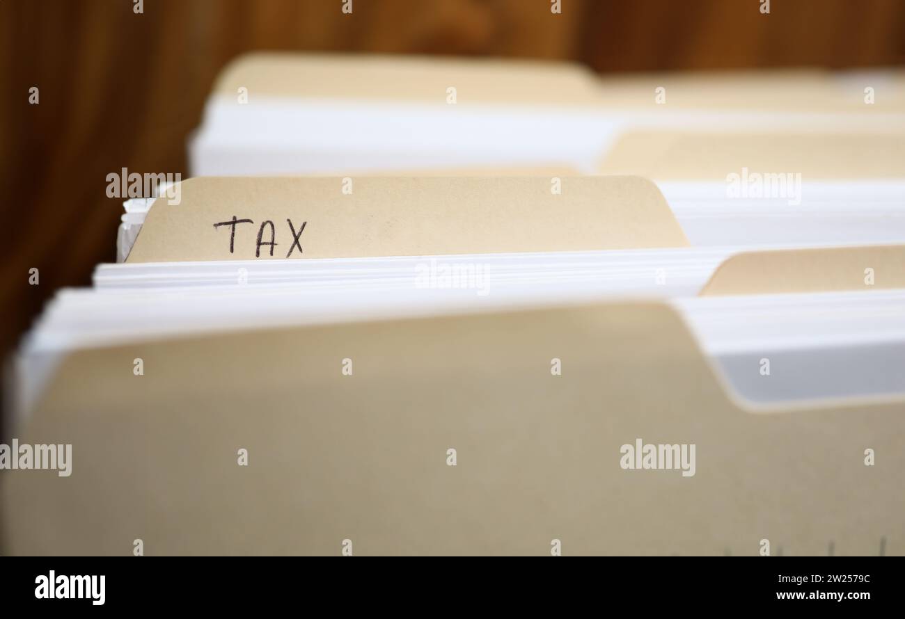 Paper folder of tax form 2019 financial report Stock Photo - Alamy