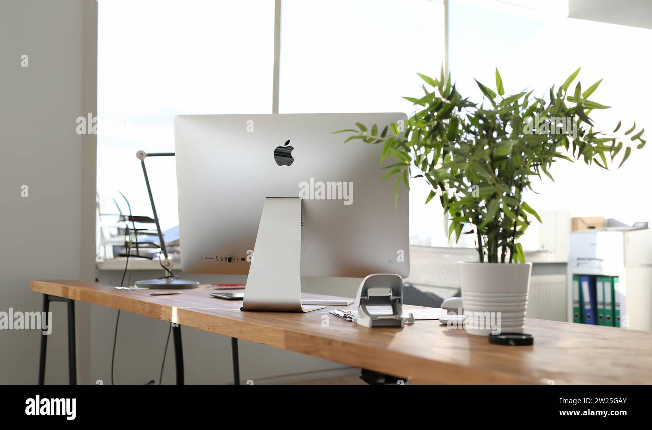 Modern pc apple imac in office table Stock Photo - Alamy