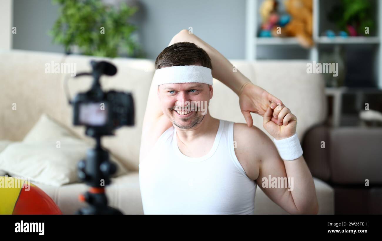 Man Vlogger Doing Exercise for Hands Portrait Stock Photo - Alamy