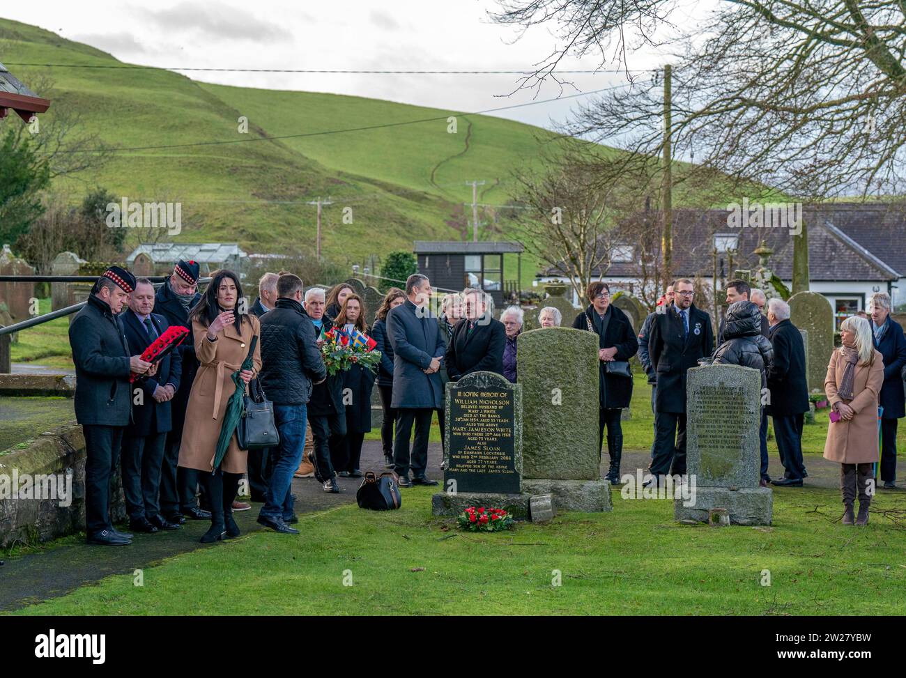 People gather in the grounds of Tundergarth Church for a service to ...