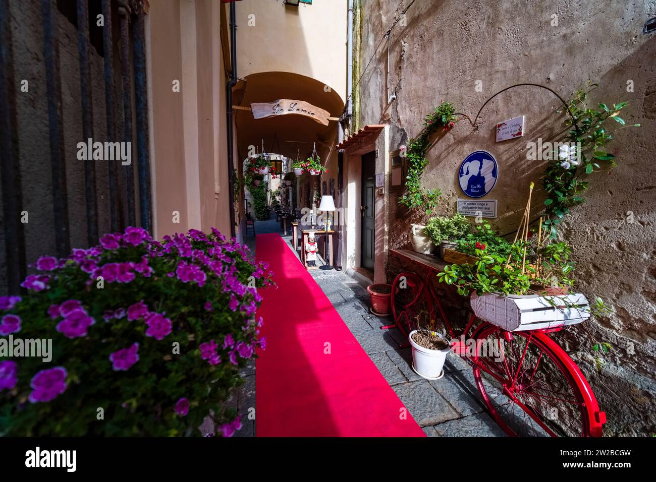 Beautifully decorated entrance to a restaurant in the narrow streets of ...
