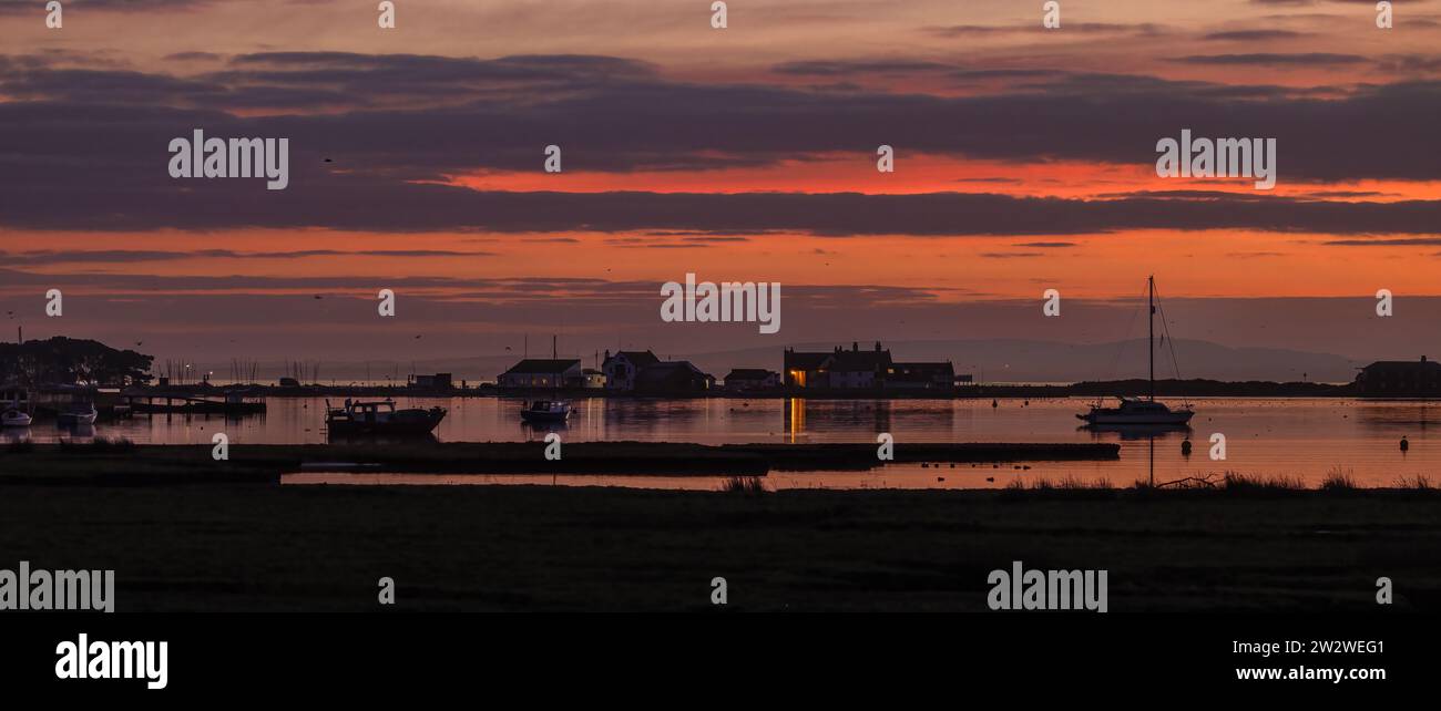 Dawn over beach huts hi-res stock photography and images - Alamy