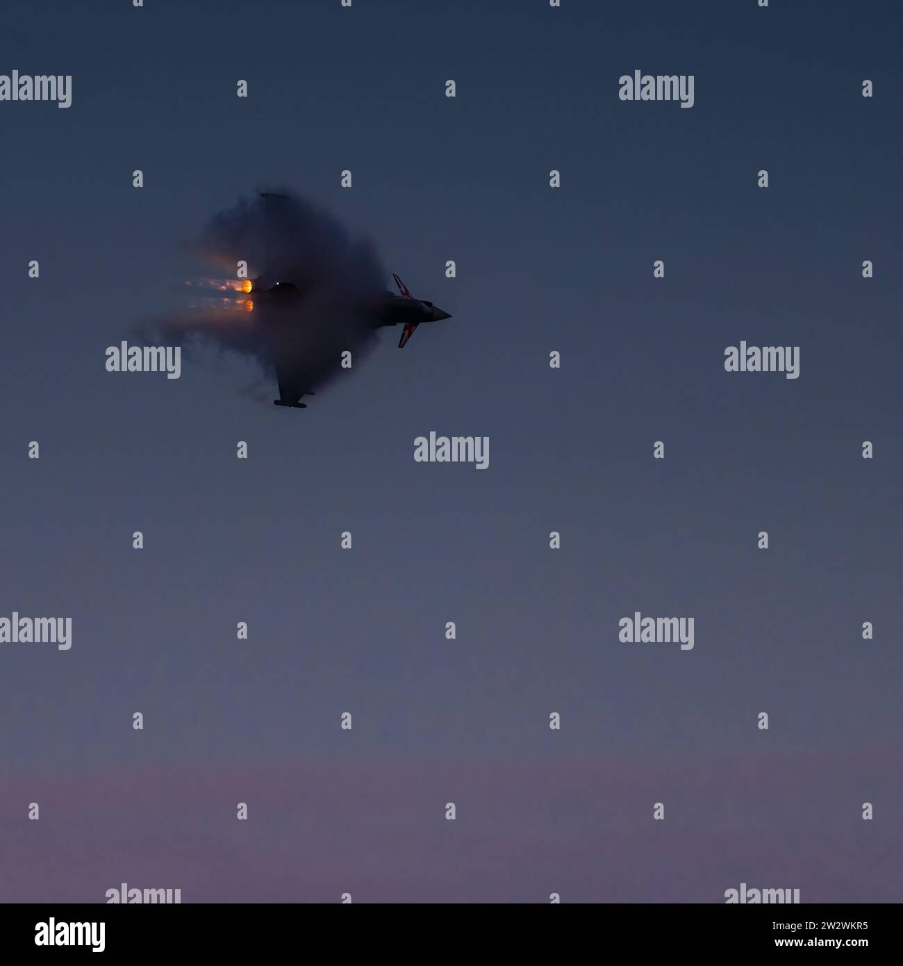 Typhoon jet performing at dusk Stock Photo - Alamy