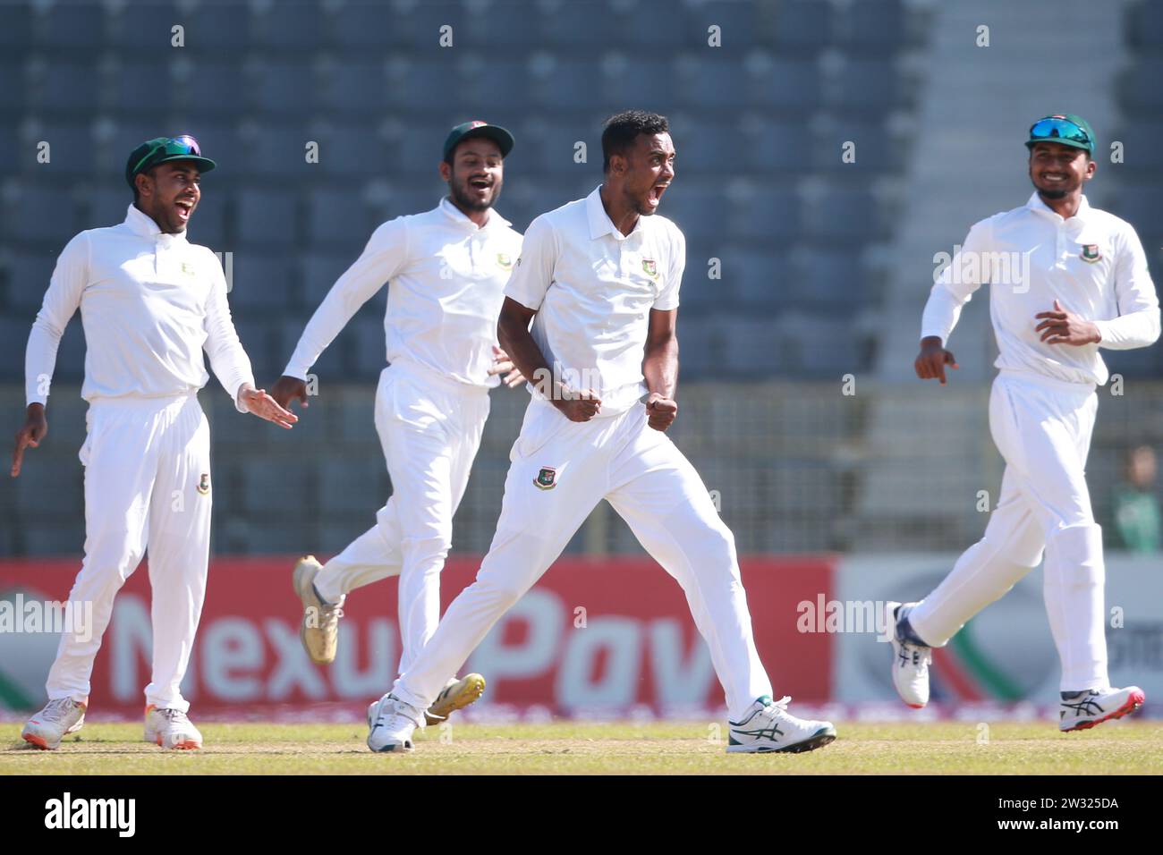 Bangladeshi pace bowler Shoriful Islam (M) celebrates Bangladesh-New ...