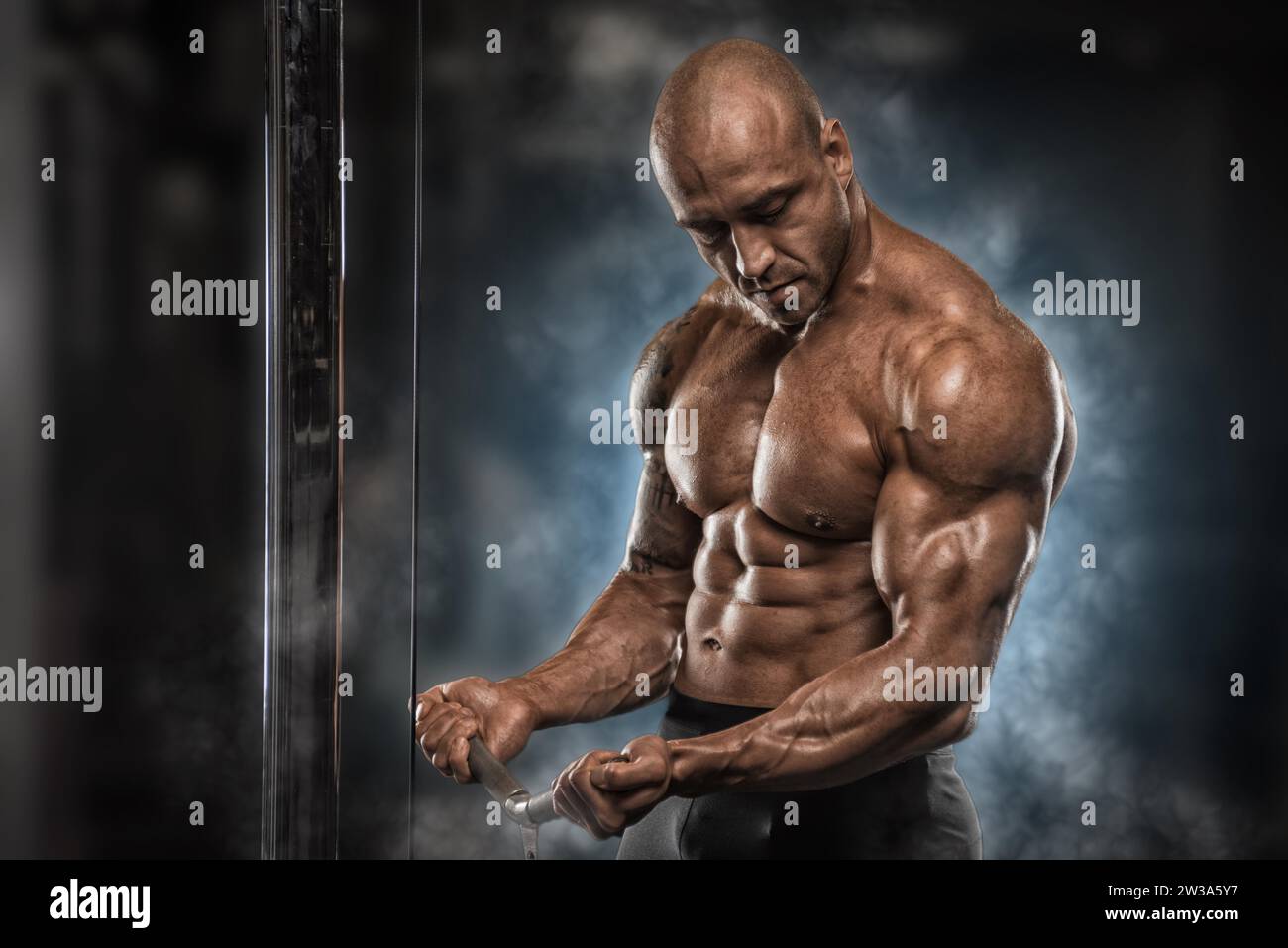 Big angry athlete trains in the gym Stock Photo - Alamy