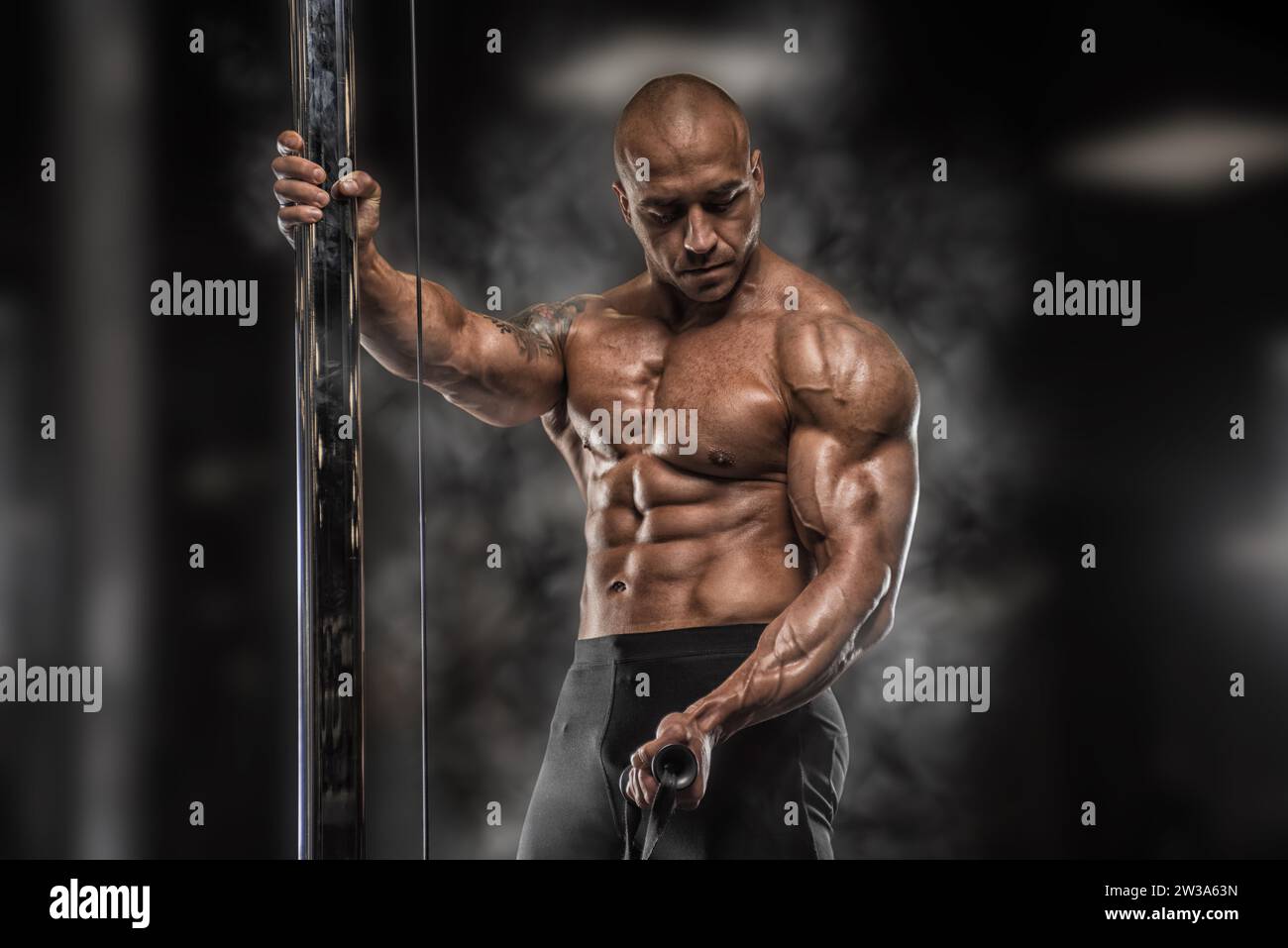Big angry athlete trains in the gym Stock Photo - Alamy