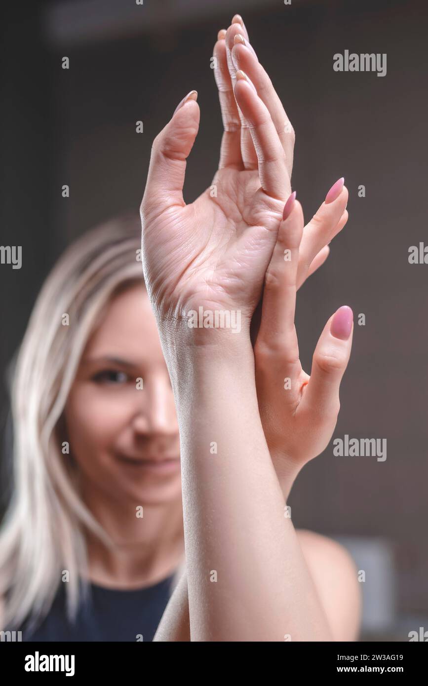 Image of intertwining female hands. Female support concept. Women's ...