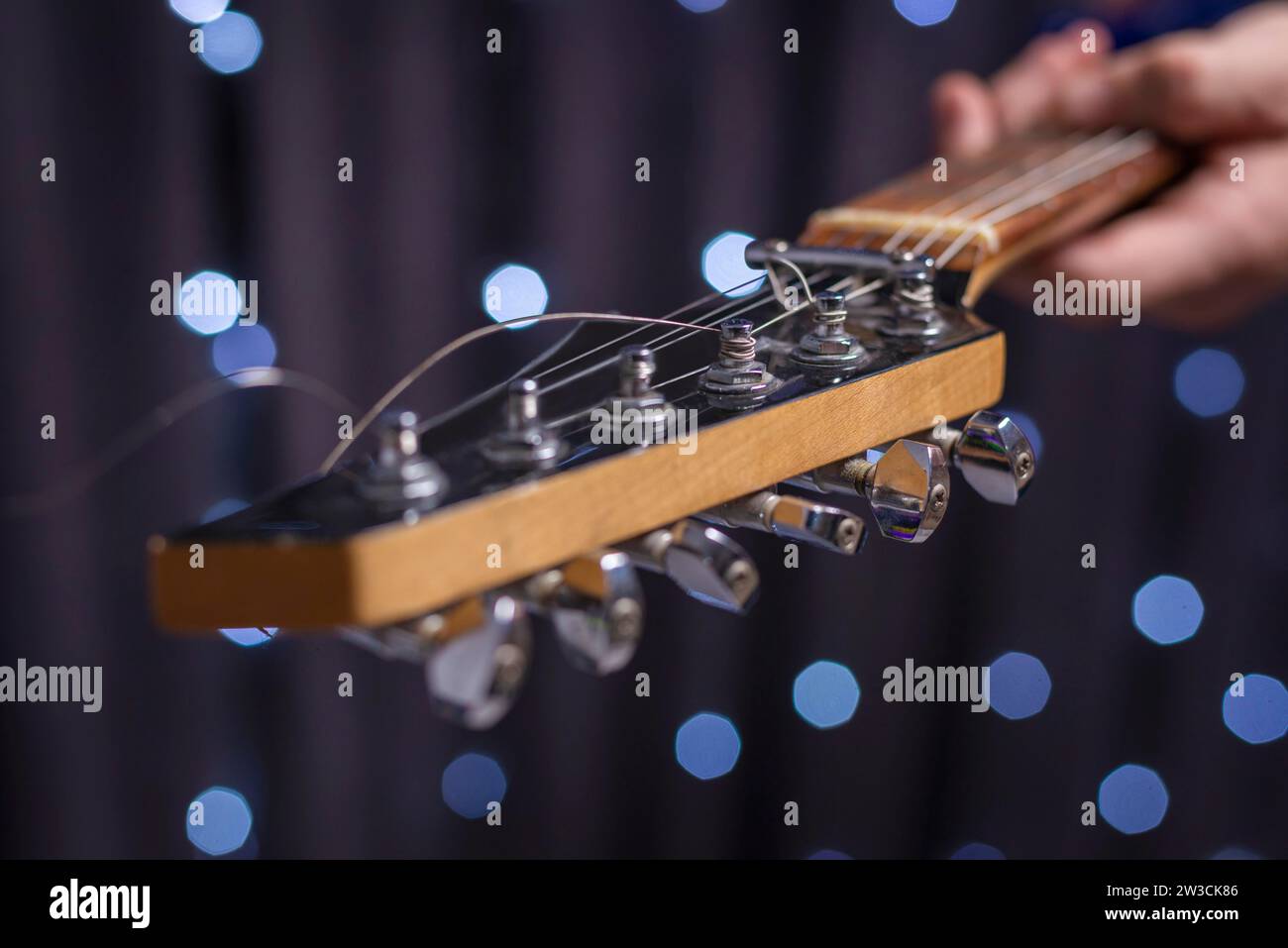 Image of the strings of an electric guitar close-up. The concept of ...