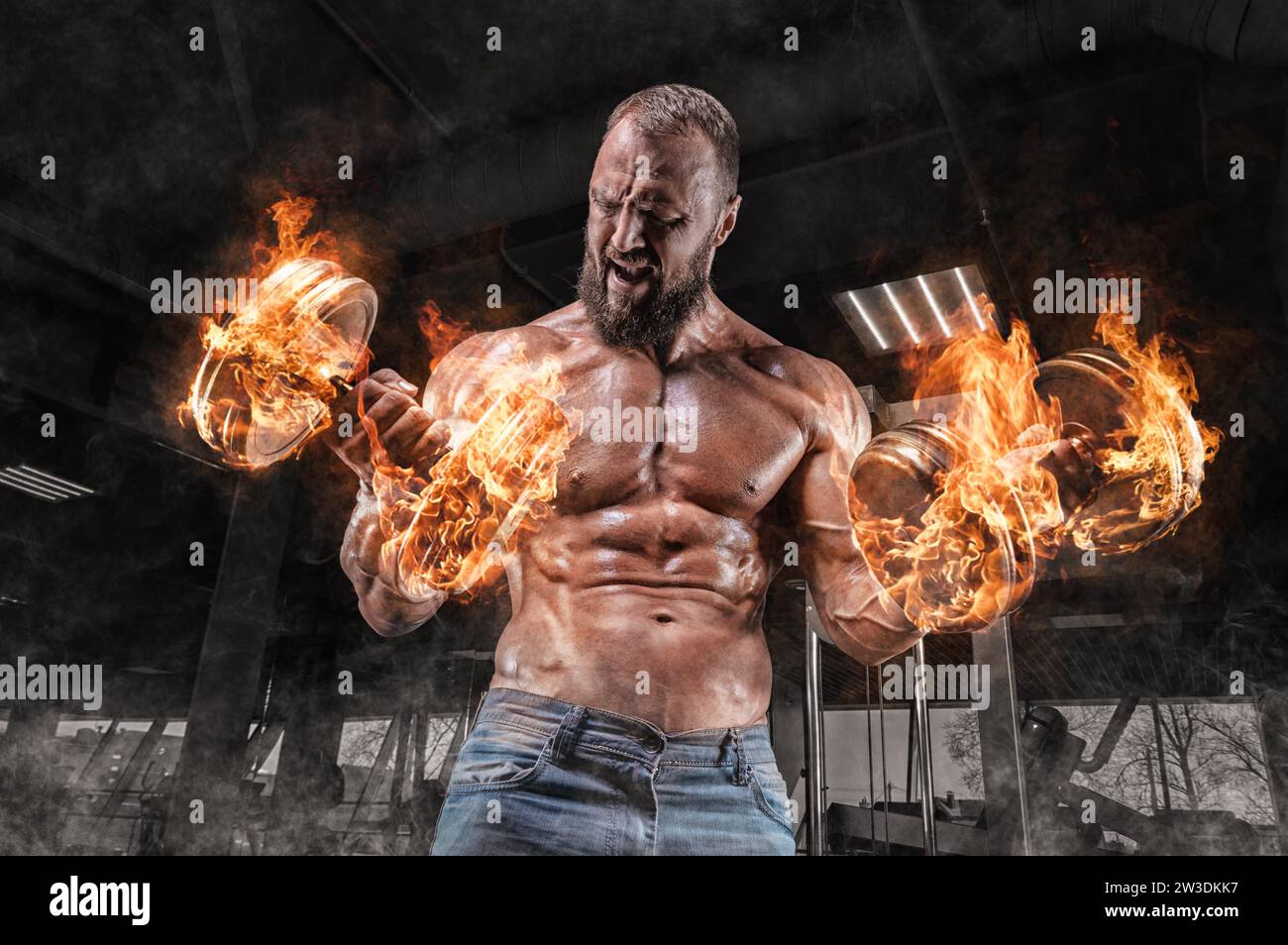 Professional athlete trains with fire dumbbells in the gym. Bicep ...