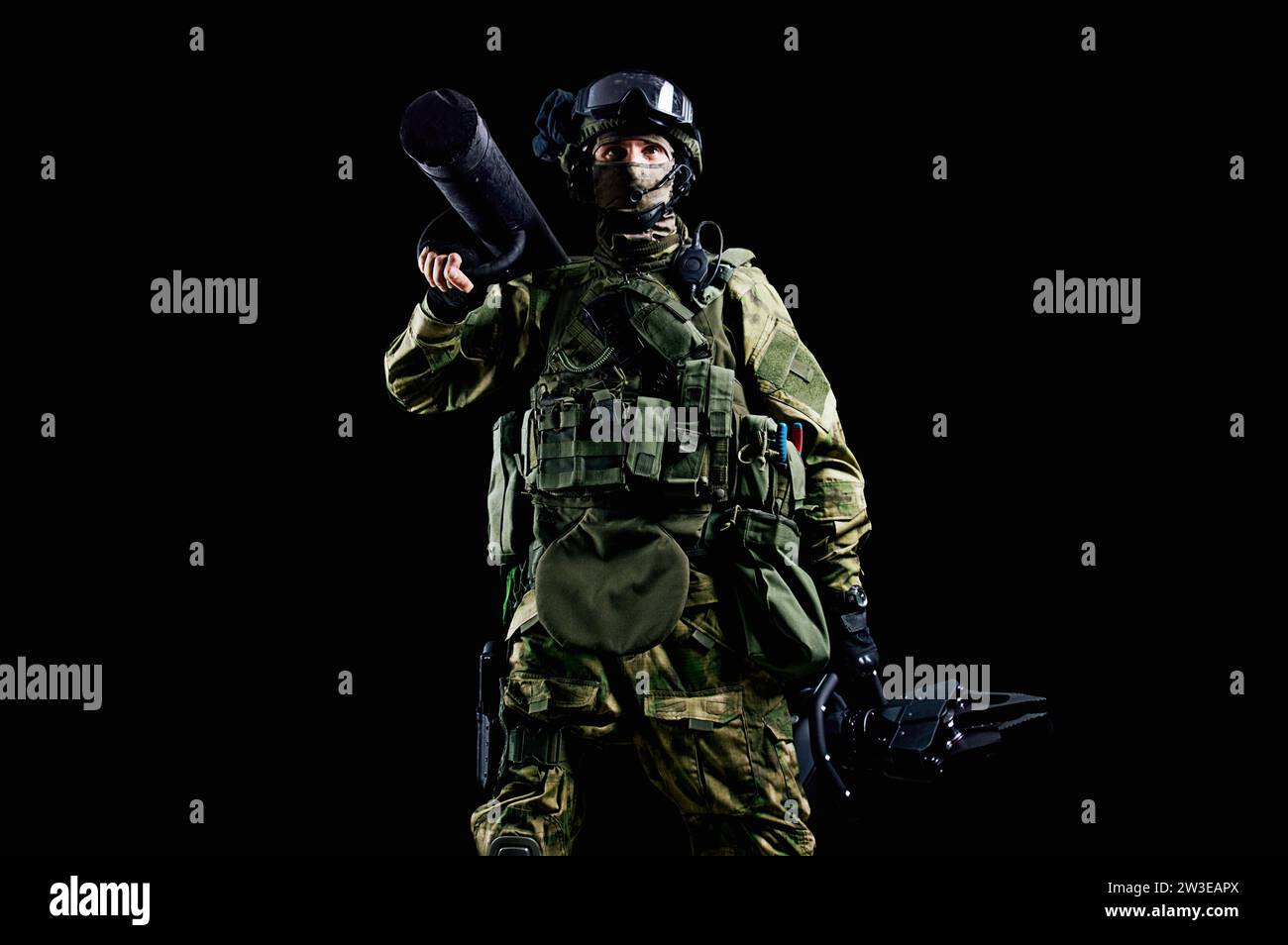 The soldier of the special unit stands in military uniform with a ram ...