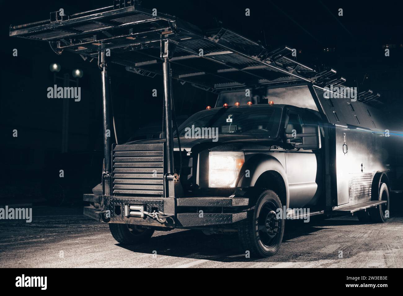 Image of a truck with a ladder on the roof. Anti-terror concept. Special machines for SWAT ...