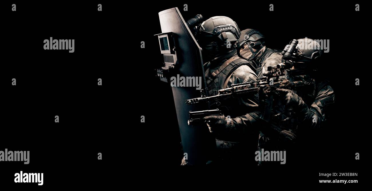 Portrait of a group of fighters of a special unit. They hide behind a ... Portrait of a group of fighters of a special unit. They hide behind a ...