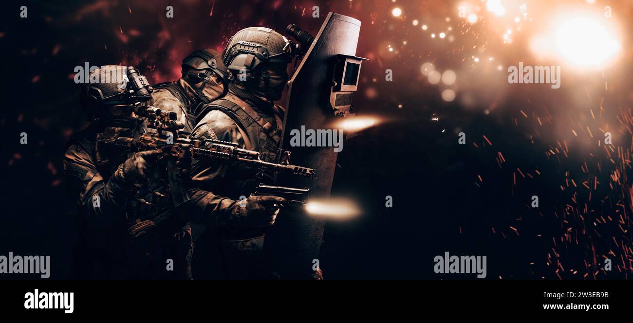 Portrait of a group of fighters of a special unit. They hide behind a ...