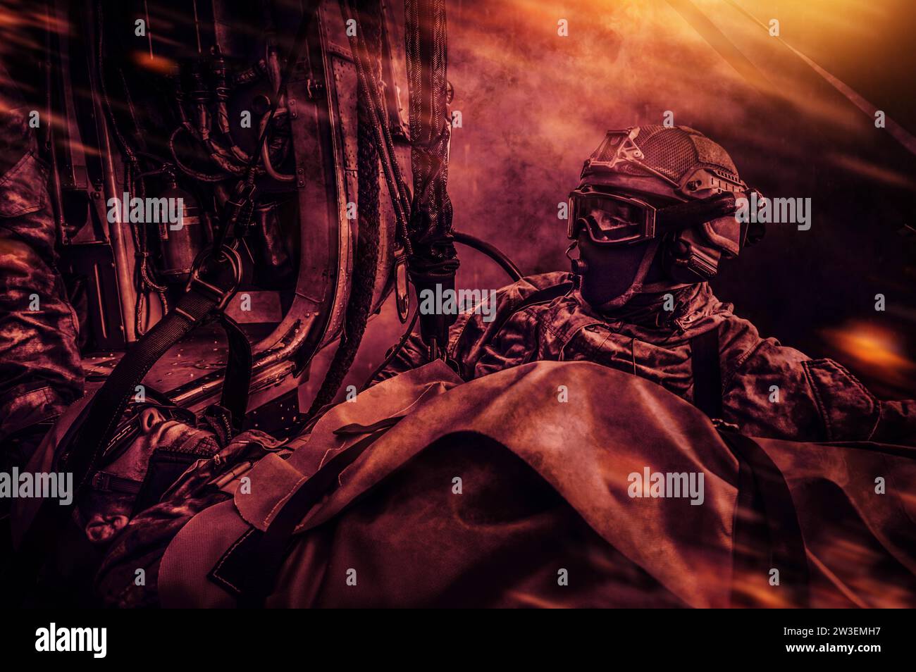 Evacuation of a wounded soldier by helicopter. Battlefield style. The ...