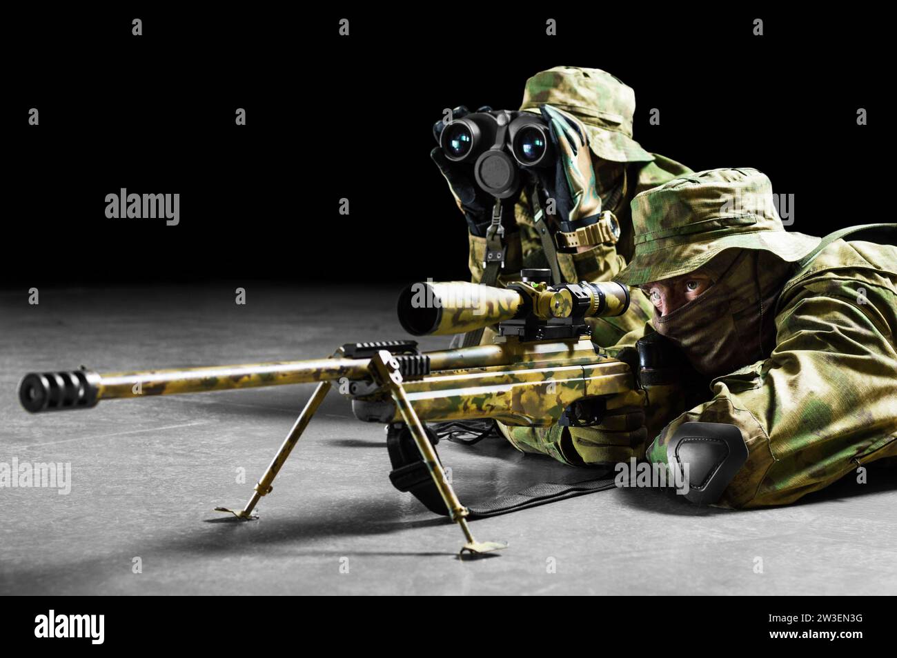 Sniper together with the gunner took the position and expect the target ...