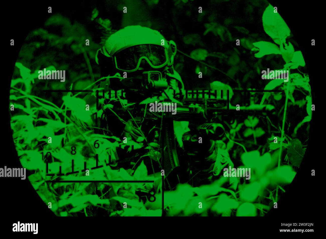 Portrait of a commando in the night sight of a sniper rifle. The ...