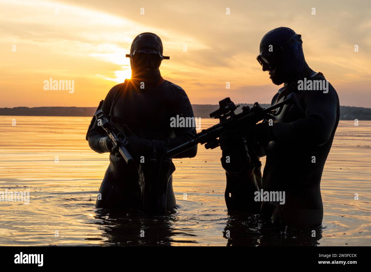 Team of fighters of a special unit move on water to complete the task ...