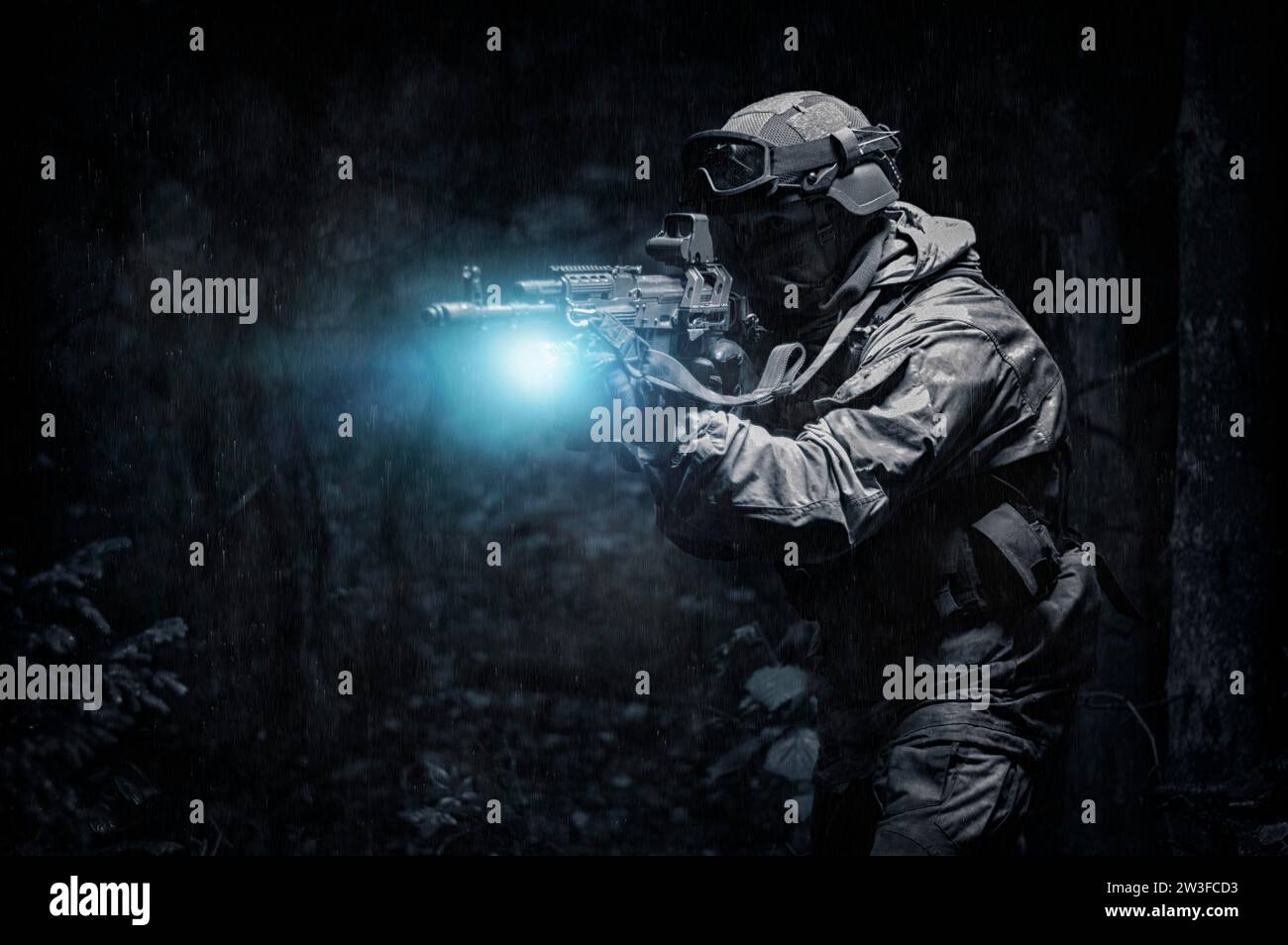 Portrait of a commando in the forest. The concept of military ...