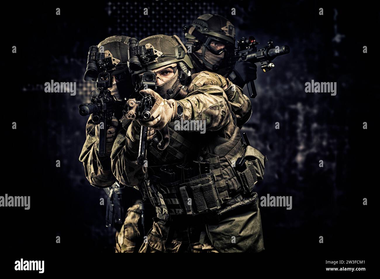 American soldiers in combat ammunition with weapons in the hands of ...