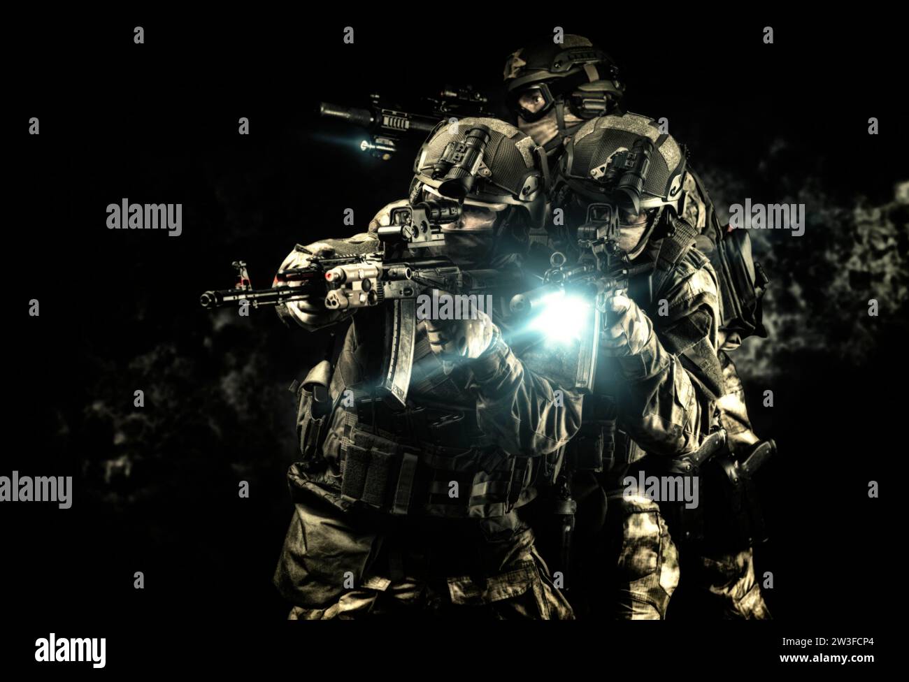 American soldiers in combat ammunition with weapons in the hands of ...