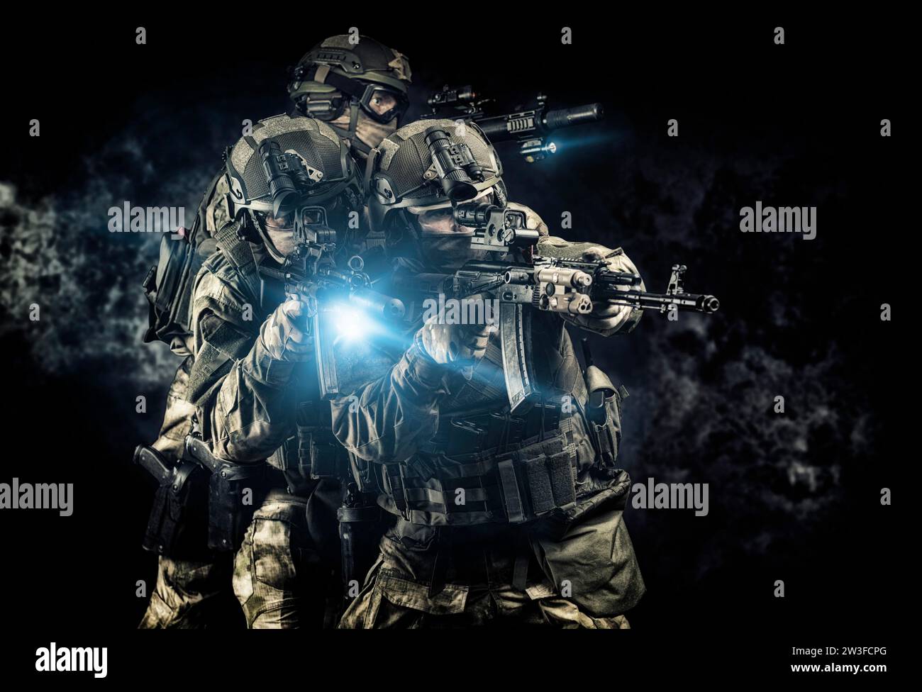 American soldiers in combat ammunition with weapons in the hands of ...