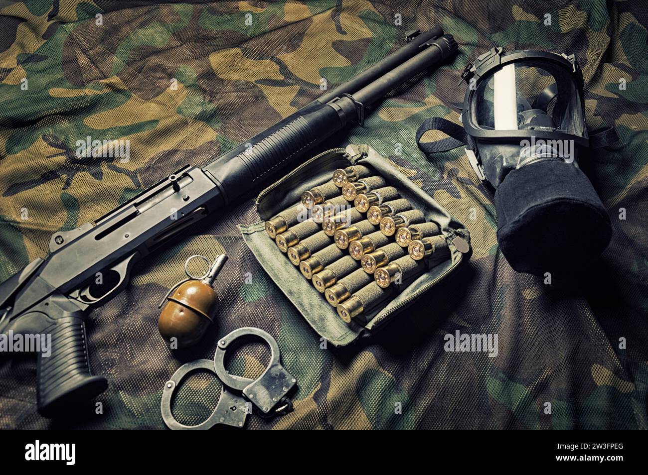 Set of weapons of a fighter of a special unit. Shotgun, ammo, grenade ...