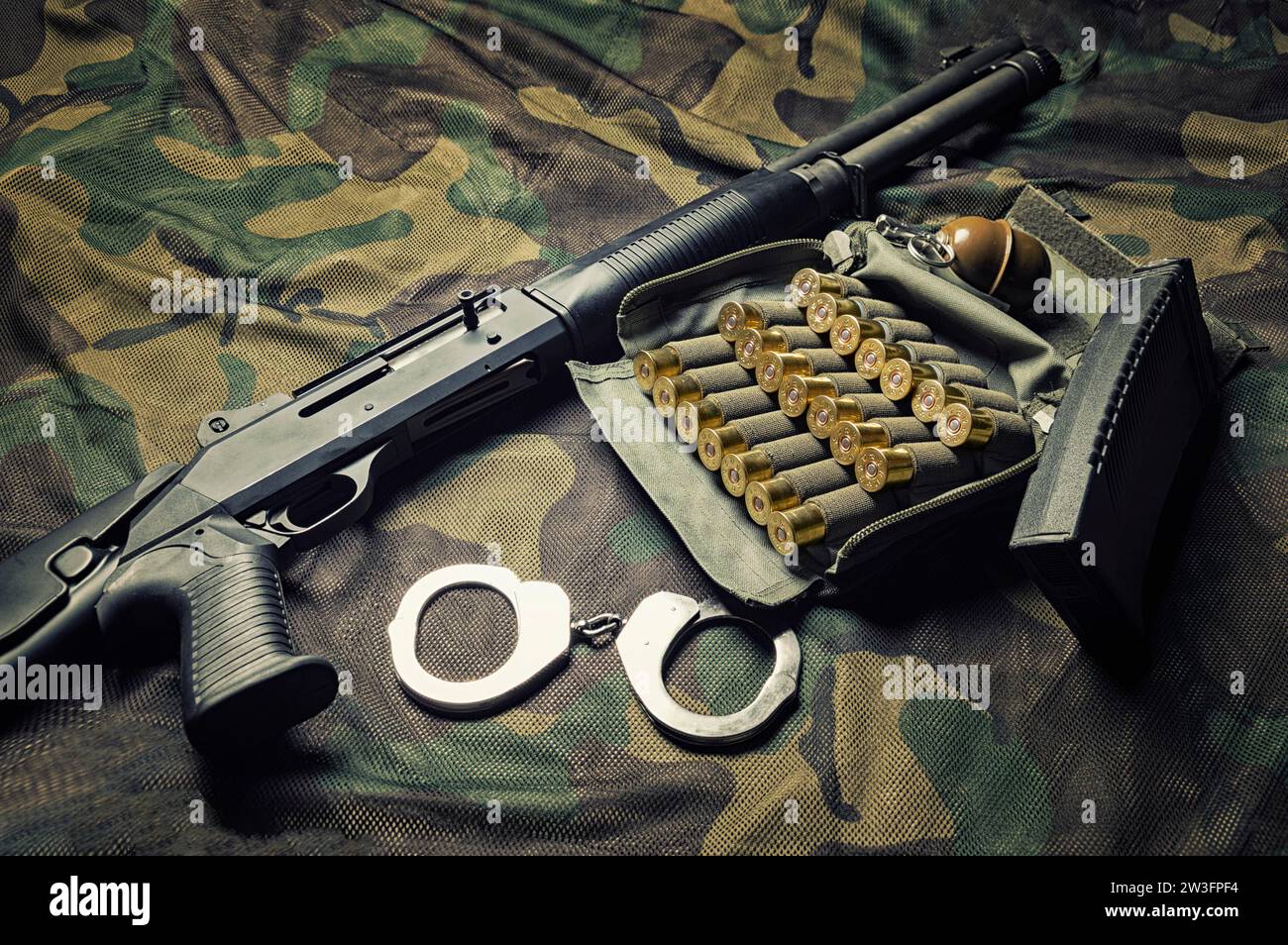 Set of weapons of a fighter of a special unit. Shotgun, ammo, grenade ...