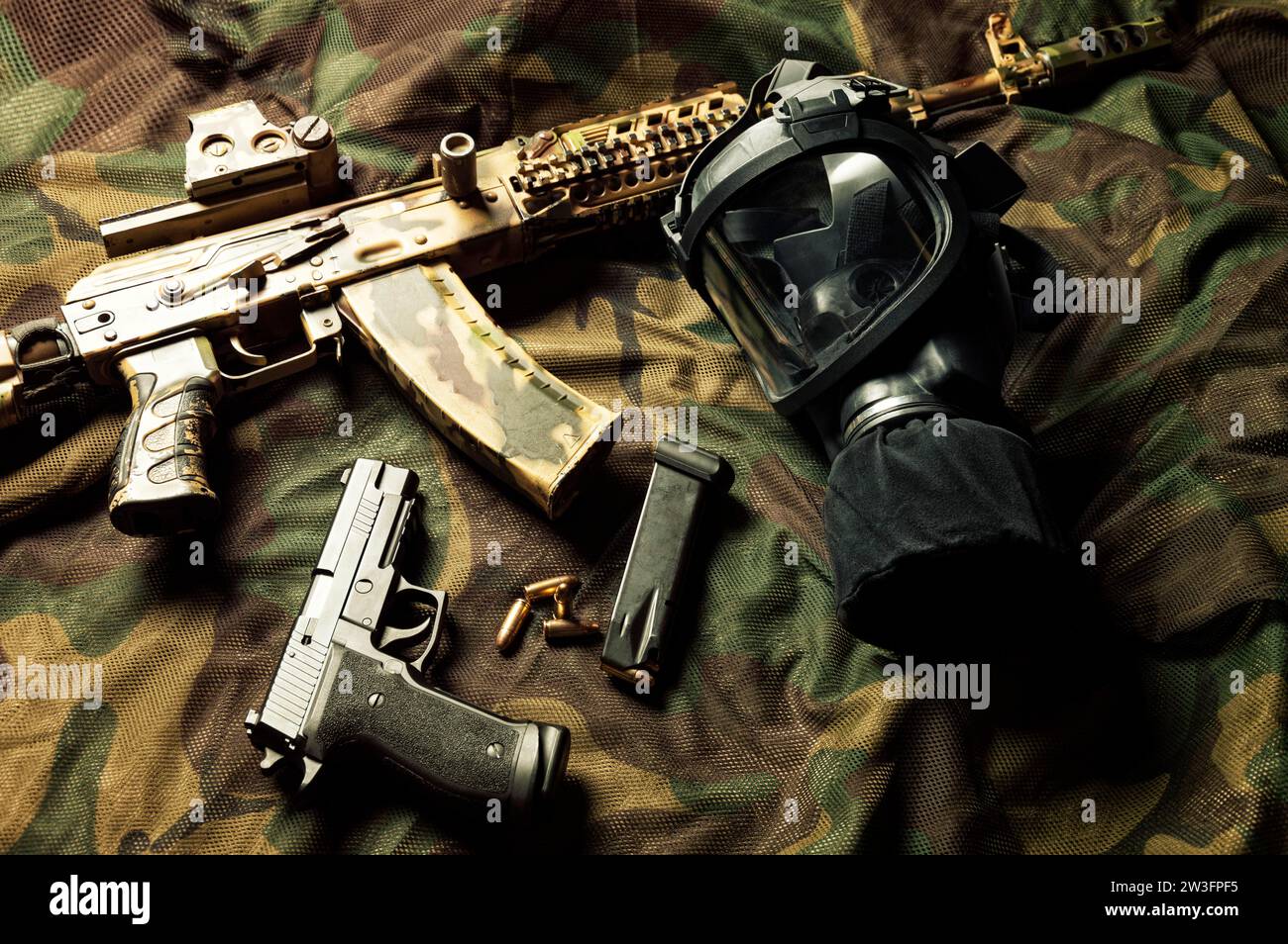Set of weapons of a fighter of a special unit. Machine gun, gas mask ...