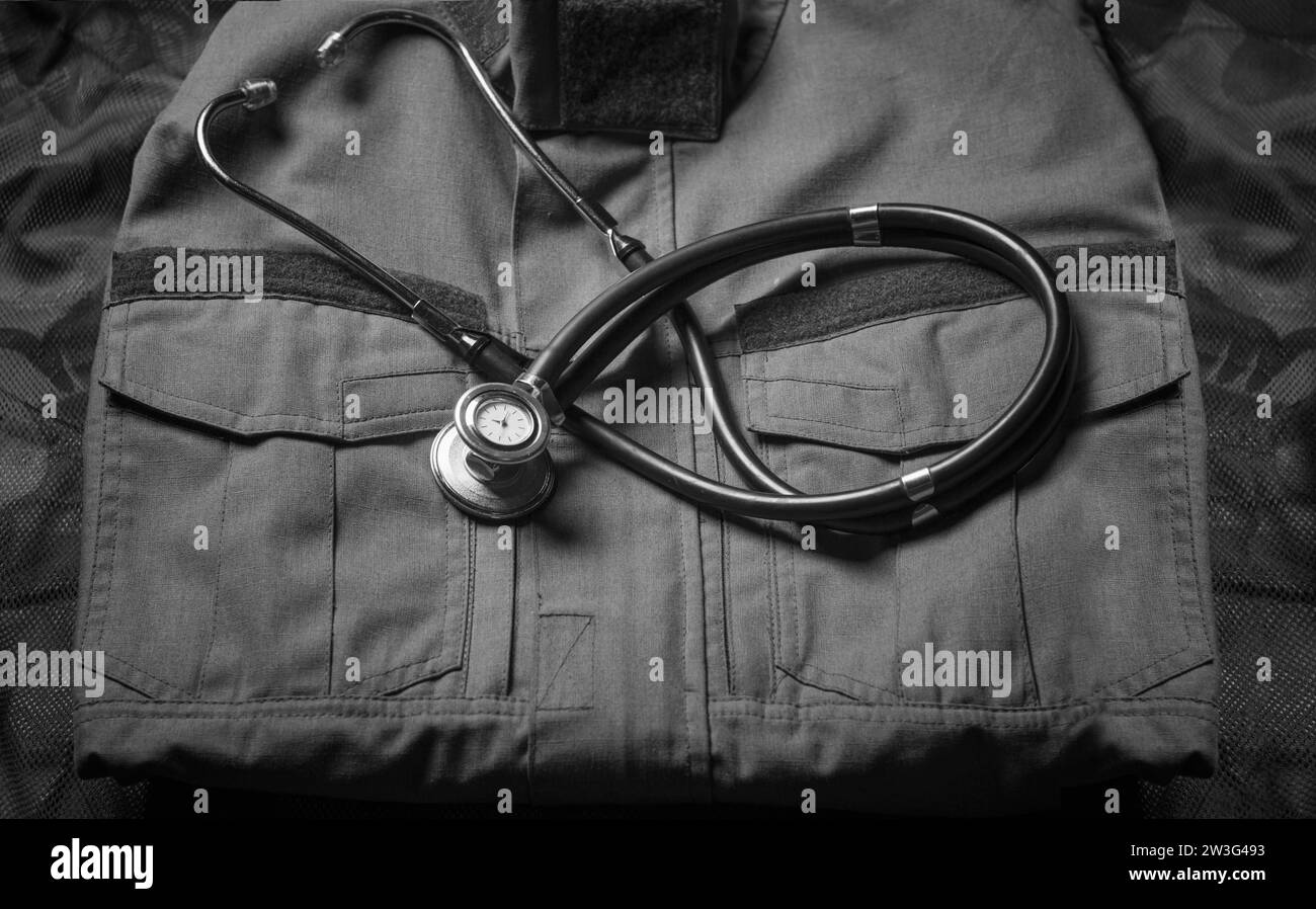 Stethoscope lies on the uniform of a US soldier. The concept of health ...