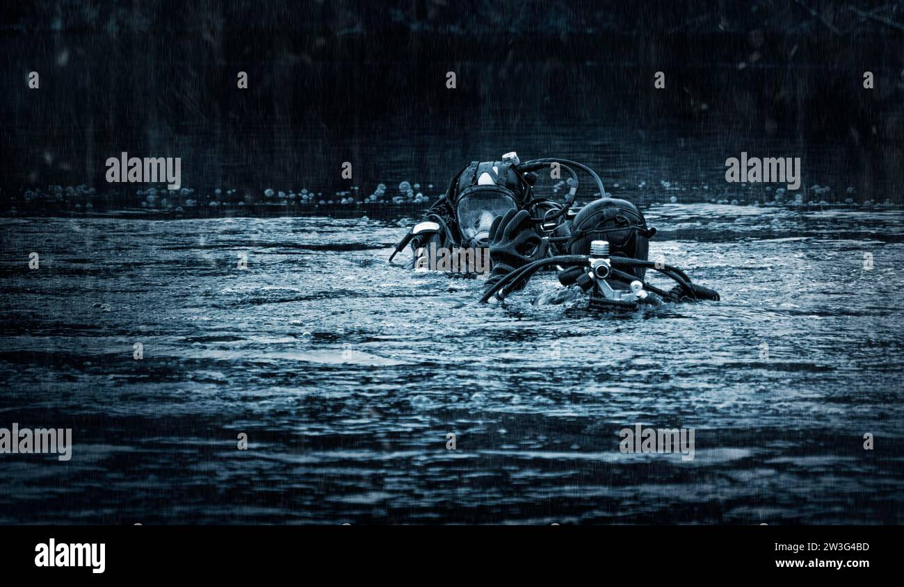 Two special forces scuba divers show each other the ok sign while ...