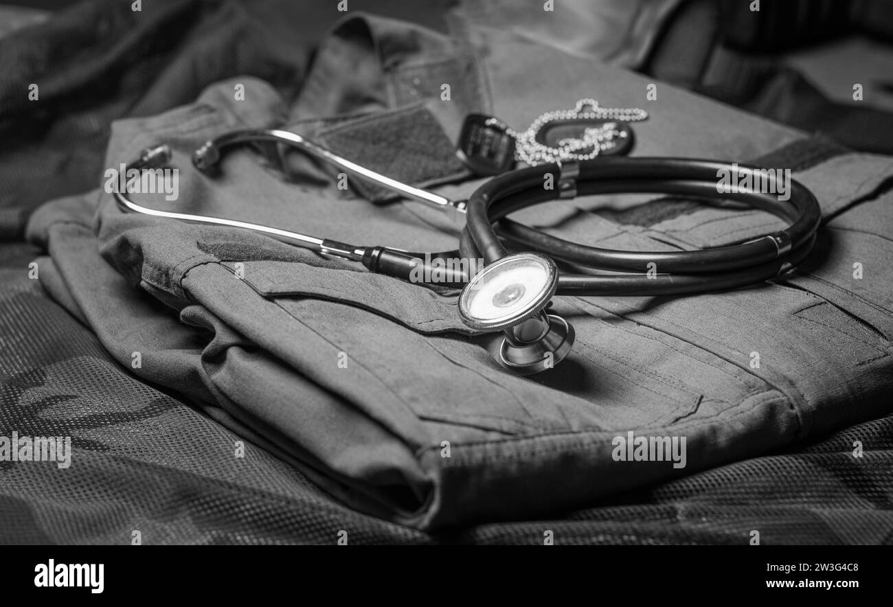 Stethoscope lies on the uniform of a US soldier. The concept of health ...