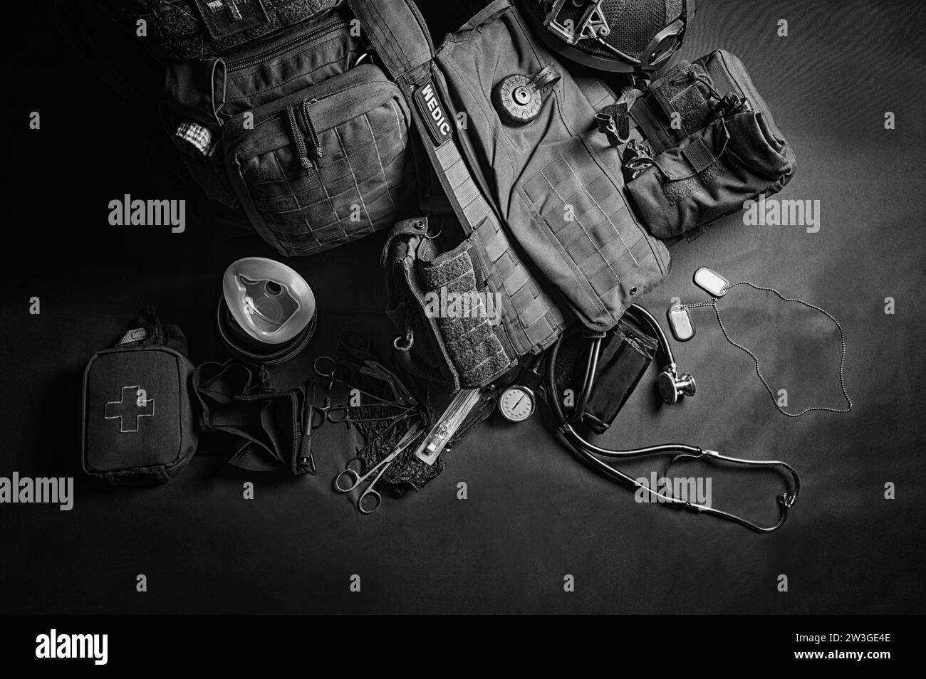 The backpack of a military medic stands on a green background. Around ...