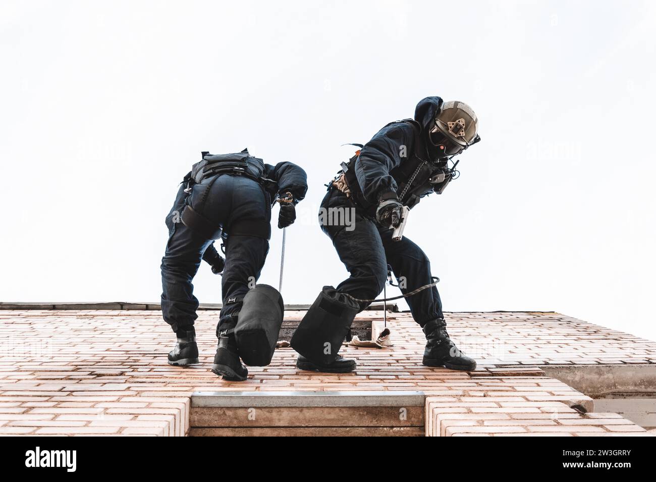 Two commandos train at the base. Climbers. SWAT, police ...