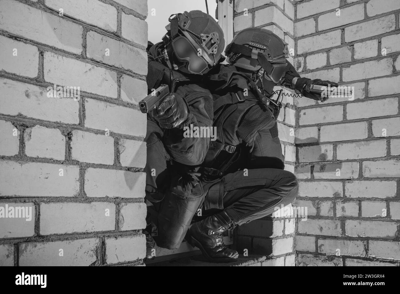 Group of special forces fighters storm the building through the window ...