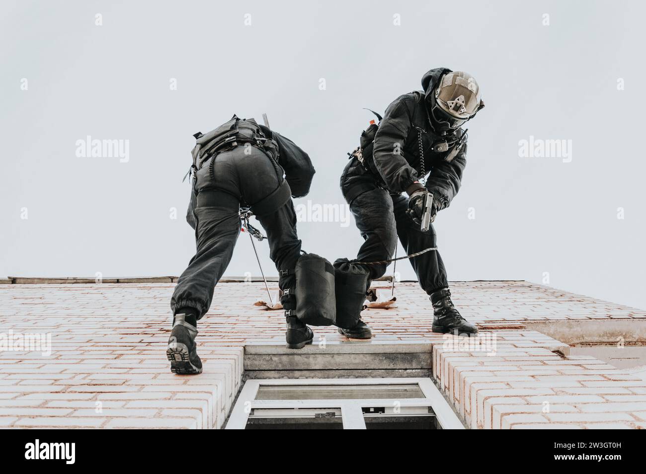 Two commandos train at the base. Climbers. SWAT, police ...