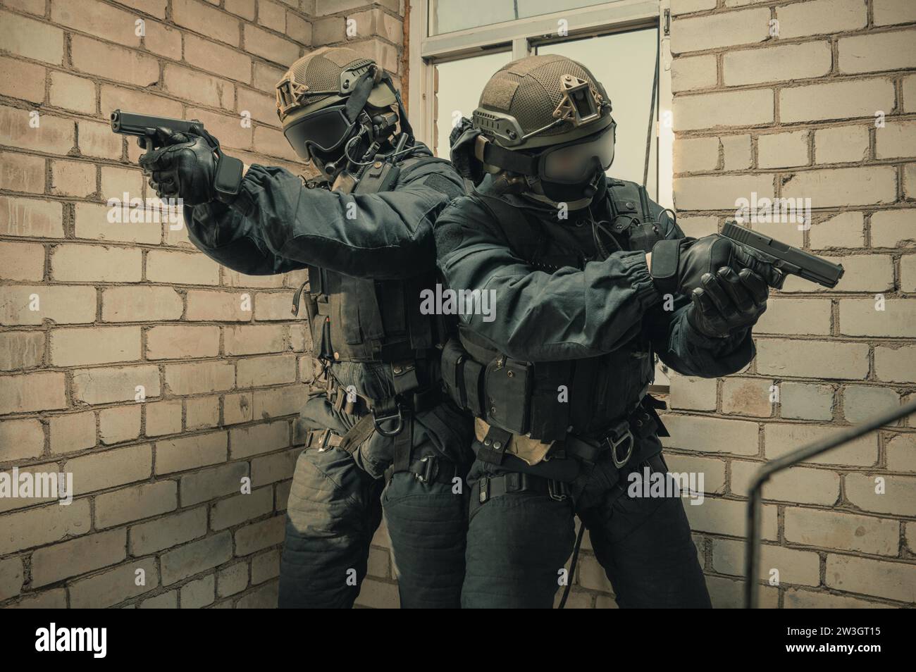 Group of special forces fighters storm the building through the window ...