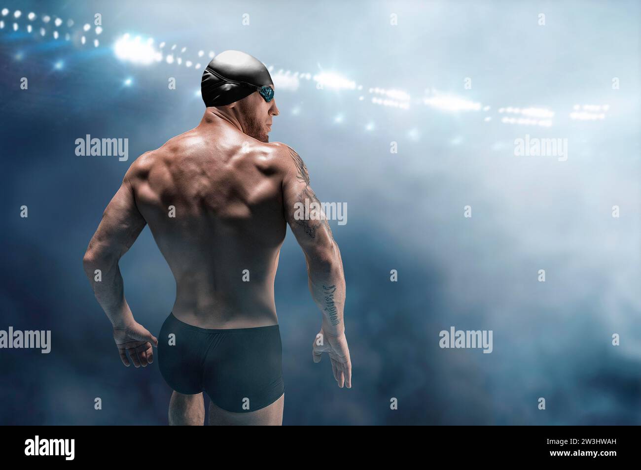 Portrait of a swimmer on the background of a sports arena. The concept ...