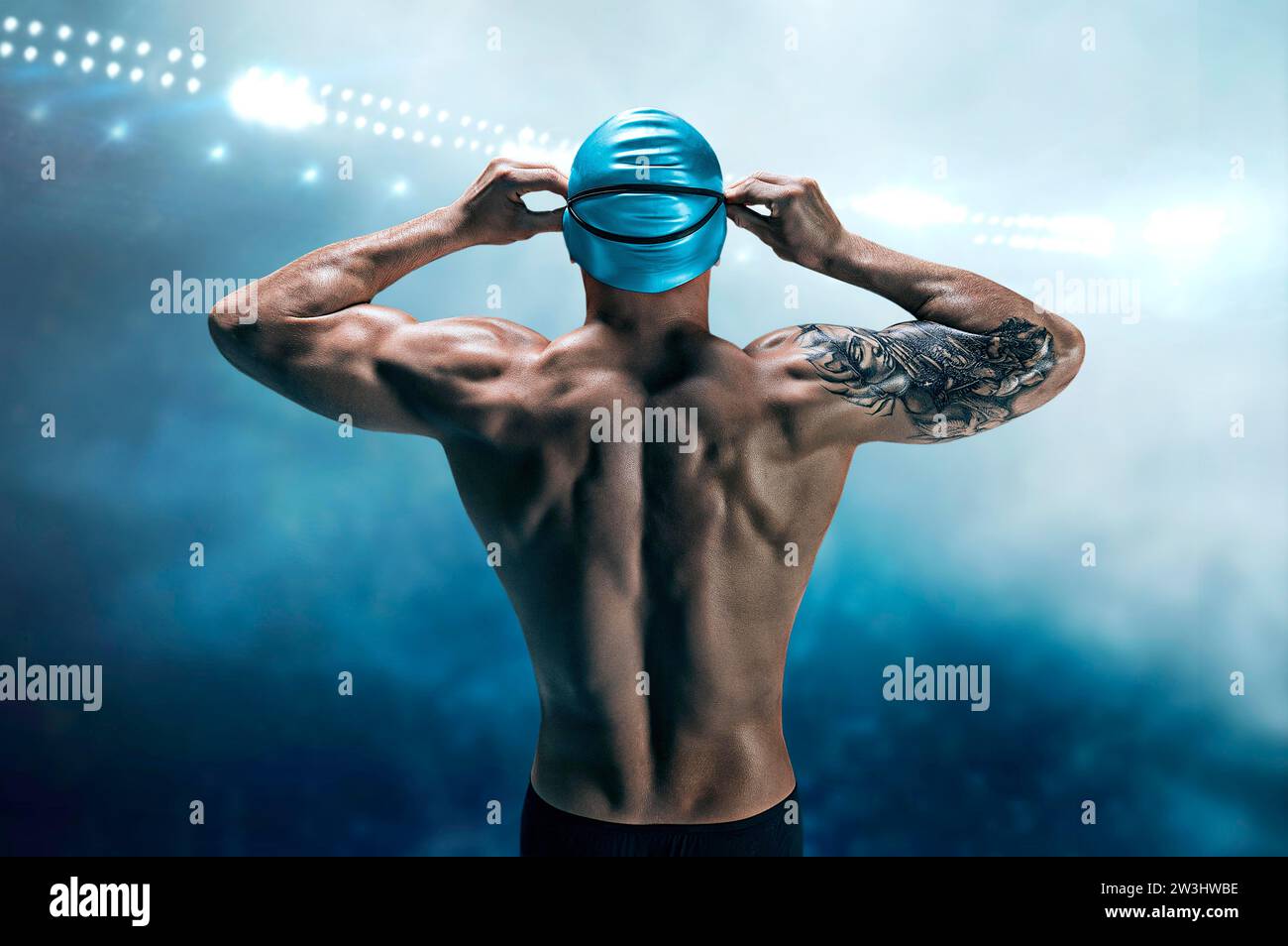 Portrait of a swimmer on the background of a sports arena. The concept ...
