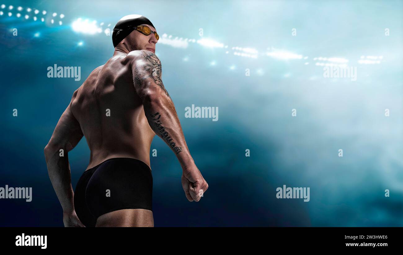 Portrait of a swimmer on the background of a sports arena. The concept ...