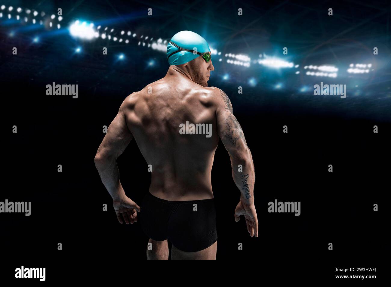 Portrait of a swimmer on the background of a sports arena. The concept ...