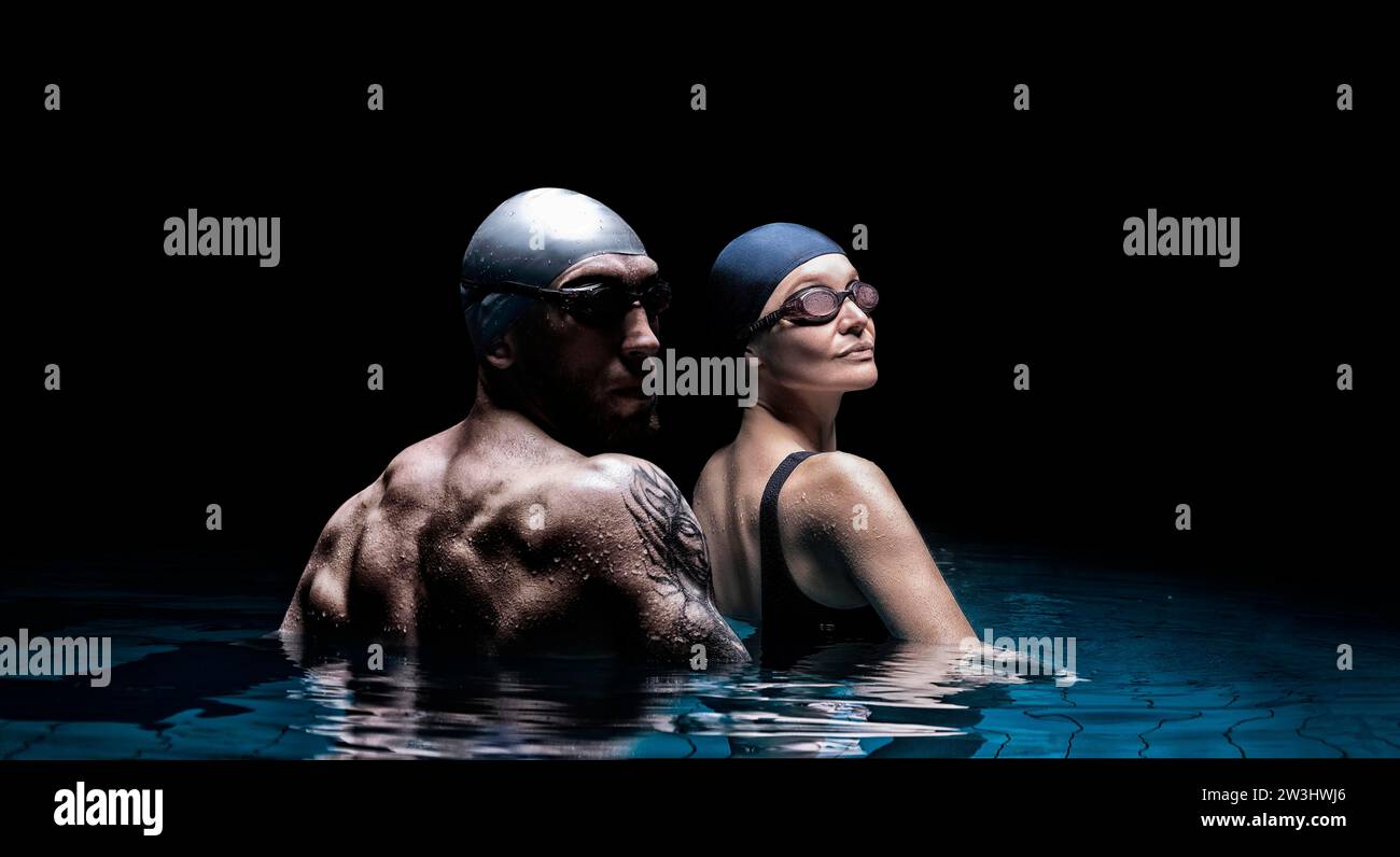 Charming woman and a strong man posing in the pool. Water sports ...