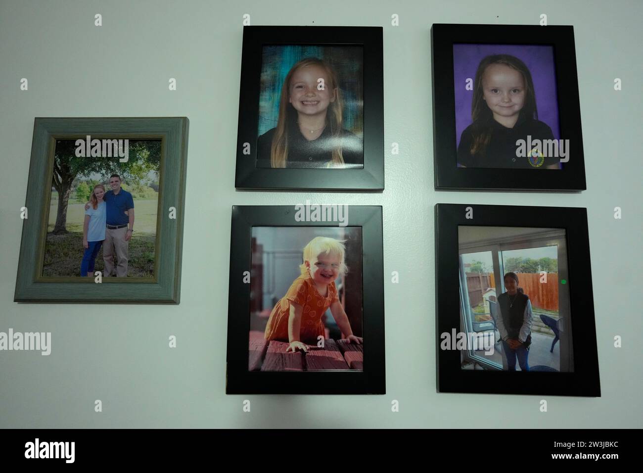 A photograph of Caroline and Andy Hazelton, left, hangs alongside ...