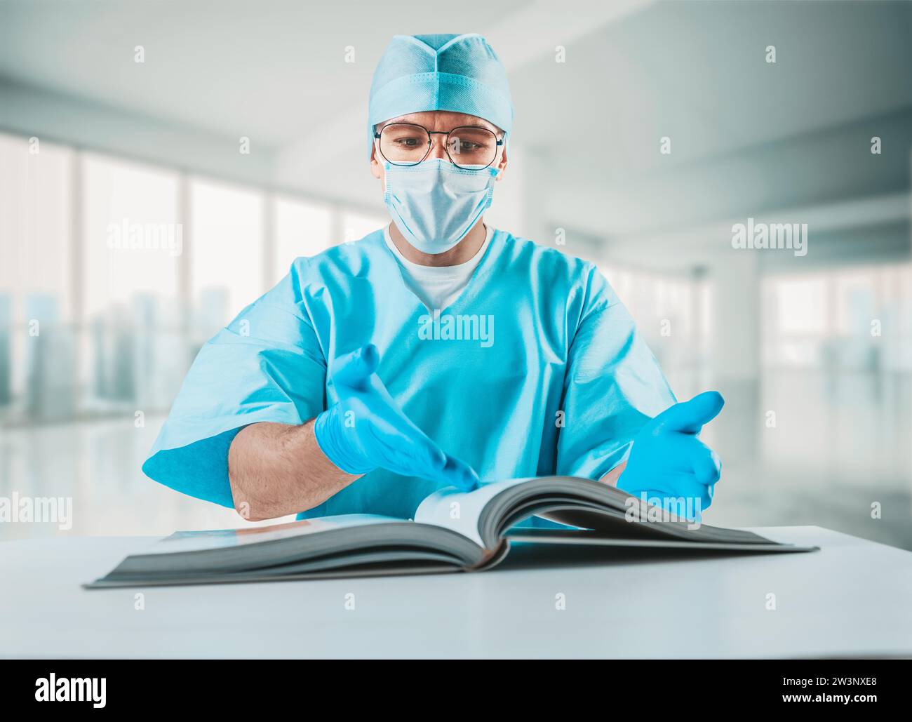 The doctor reads the textbook and points to the desired paragraph ...