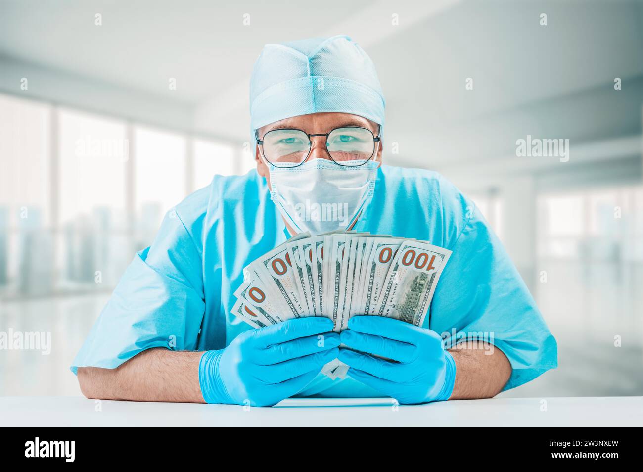 Doctor holding dollar bills hi-res stock photography and images - Alamy