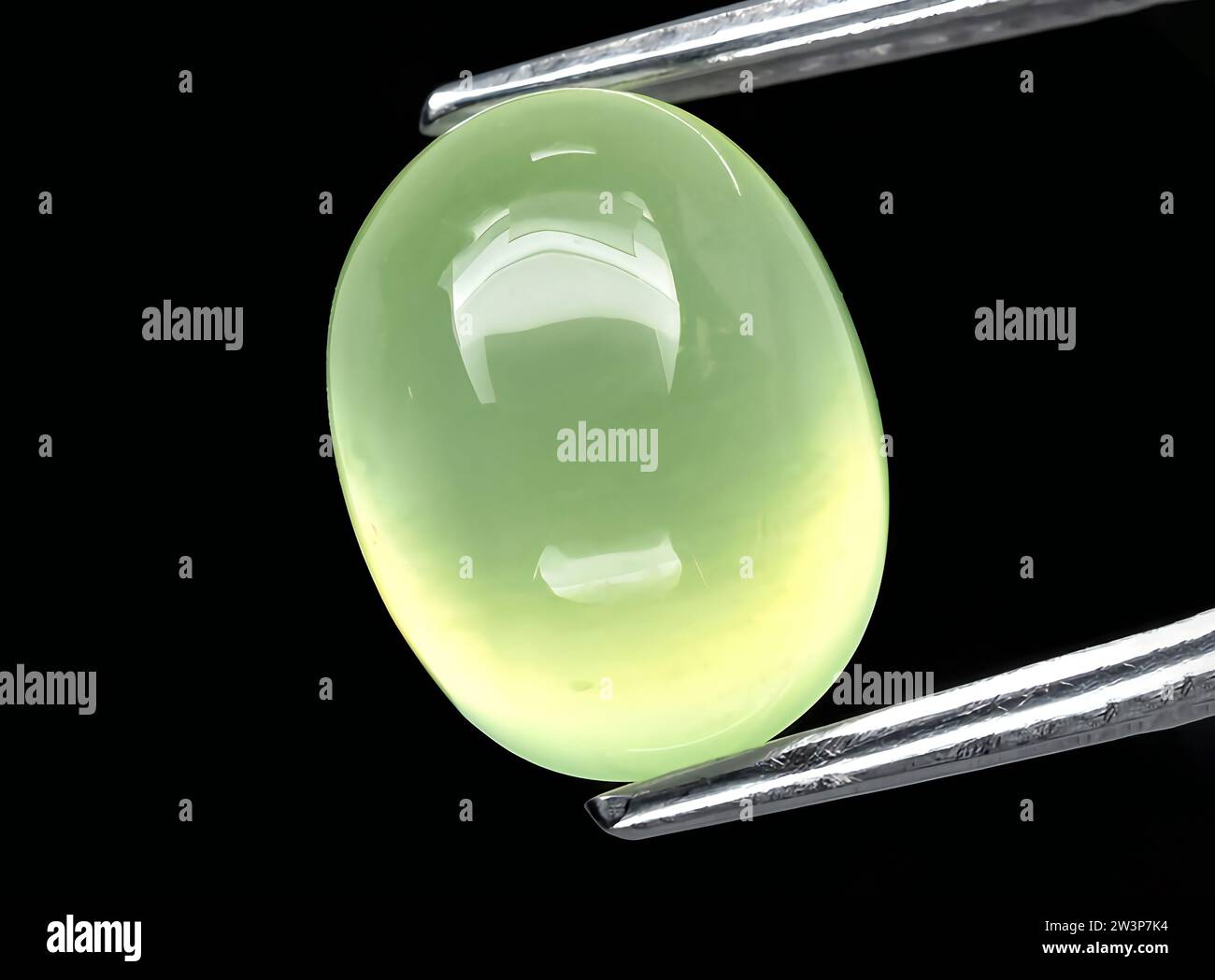 natural green prehnite gem on background Stock Photo - Alamy