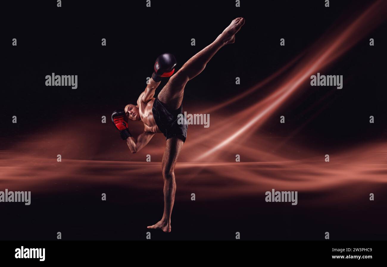 The mma fighter hits a high kick. Kickboxing concept. High quality ...