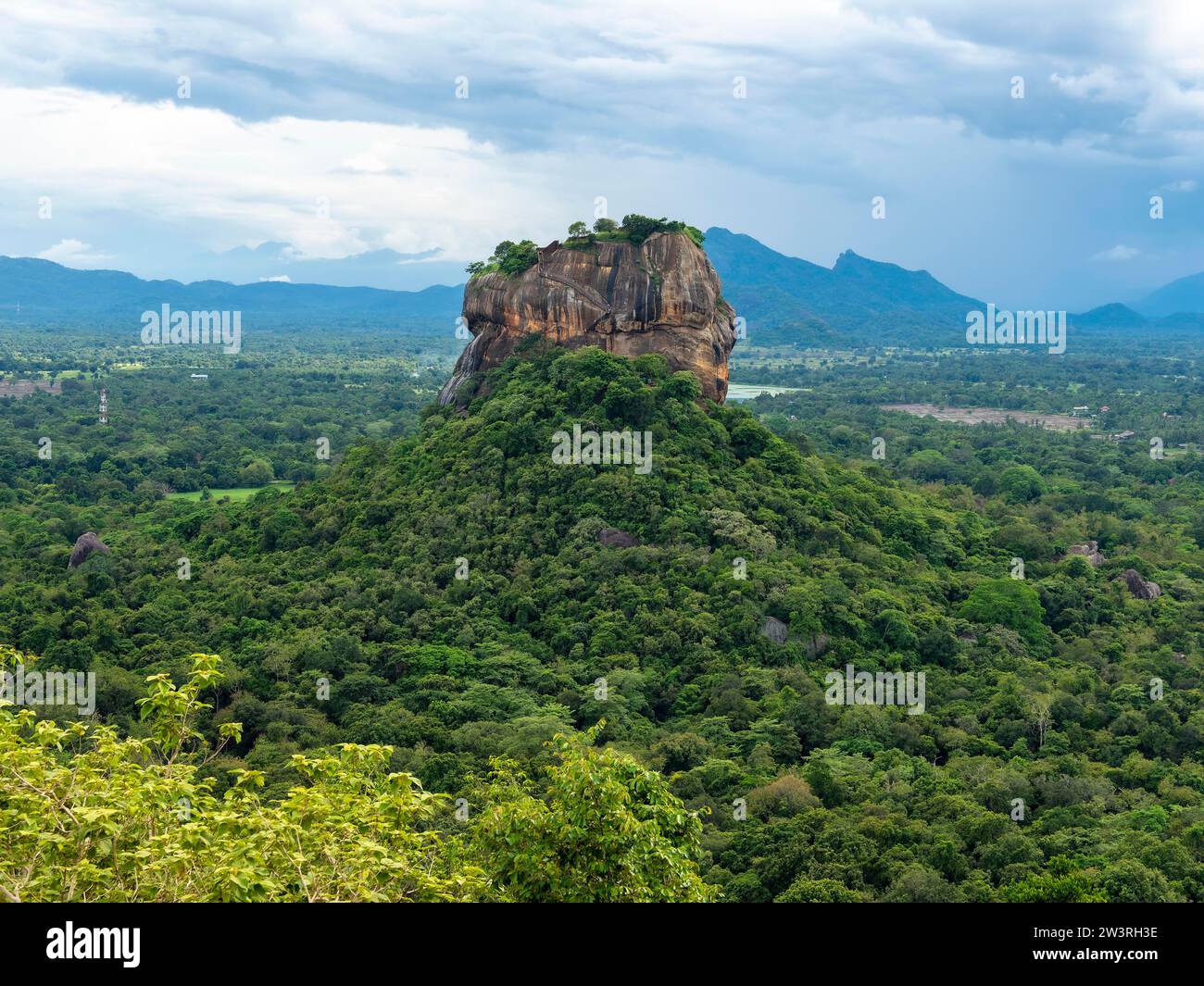 Sigiriya rocks in a green landscape, Sri Lanka Stock Photo - Alamy